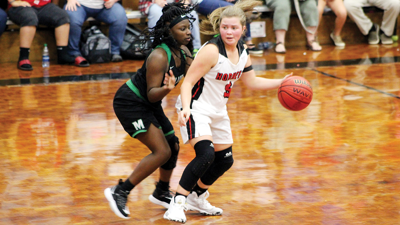 Wallace goes off for 29 in LS opening night win | Daily Leader